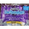 Calories in Uncrustables Peanut Butter & Grape Jelly Sandwich on Wheat ...